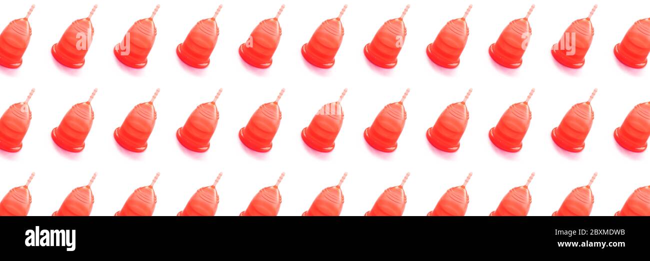 Banner made from red menstrual cup on white background. Isolated Stock ...