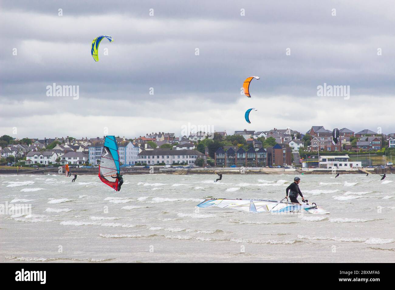 6 June 2020 Kite surfers and wind surfers enjoy the wind, waves and ...