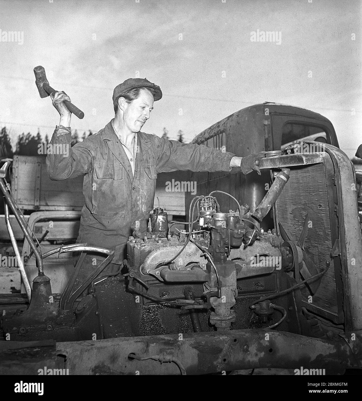 Man taking apart a motor hi-res stock photography and images - Alamy