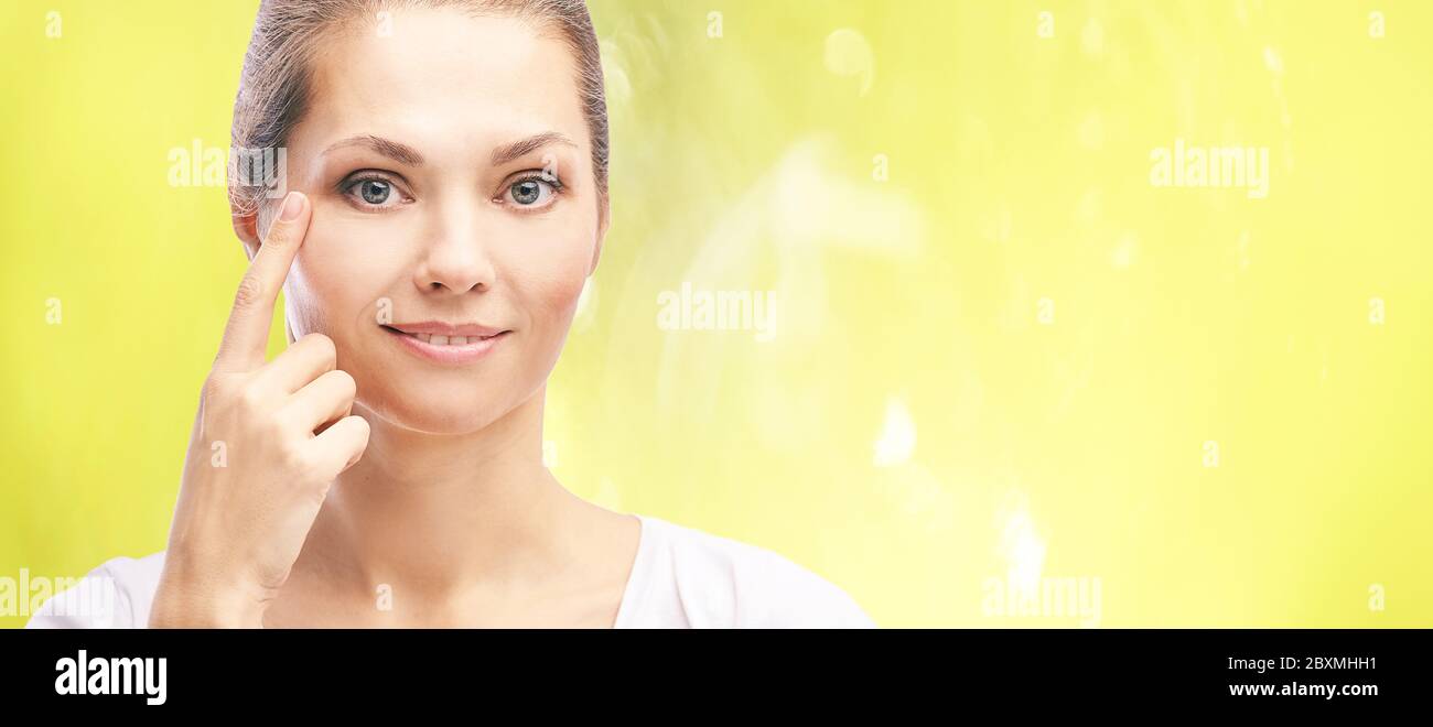 Woman point at dermatology skin problem. Cosmetology beauty girl ...