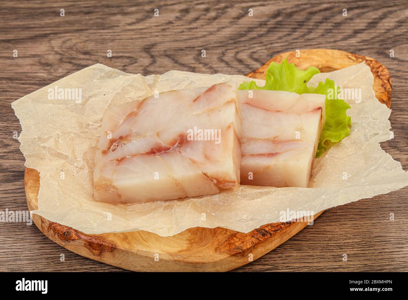 Raw dietary pollock fish fillet for cooking Stock Photo - Alamy