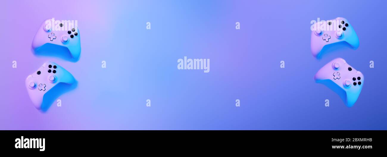 Gamepads in violet snd blue neon colors. Gamer concept Stock Photo - Alamy