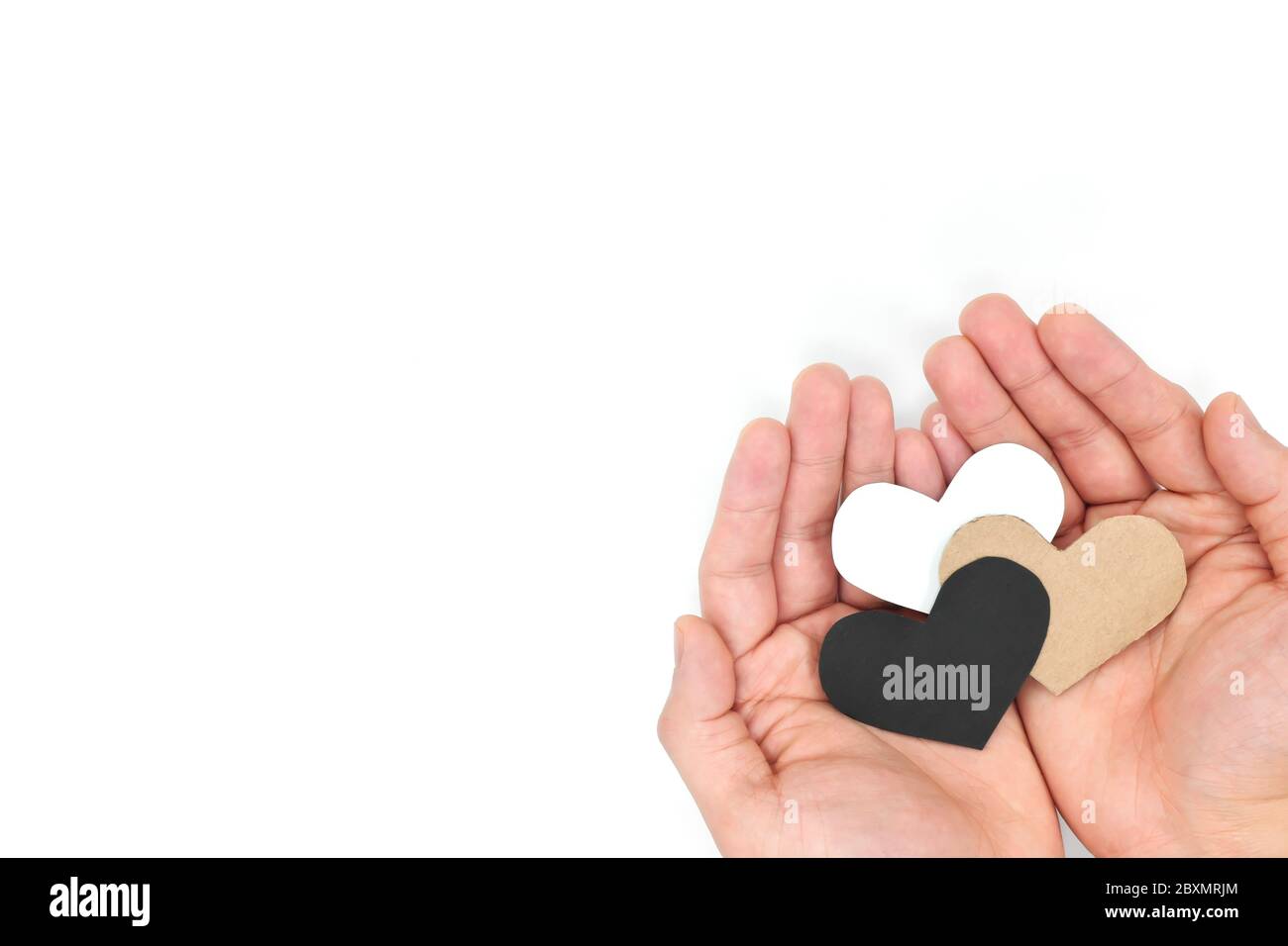 Male hands holding multicolored heart shape. Support All Lives Matter ...