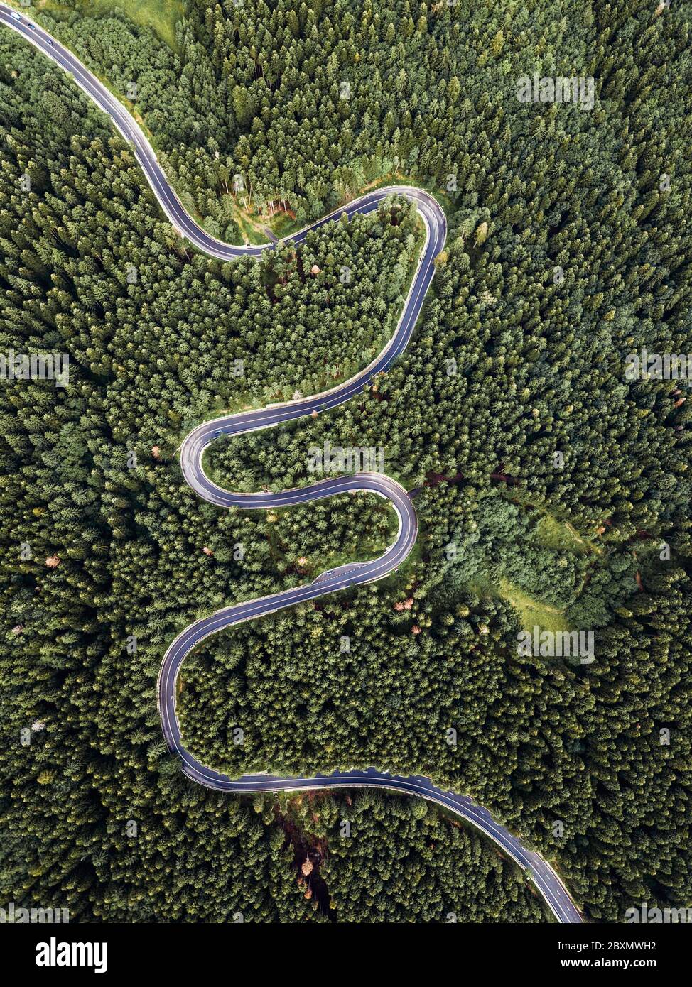 Beautiful winding road captured from above with drone at Transylvania ...