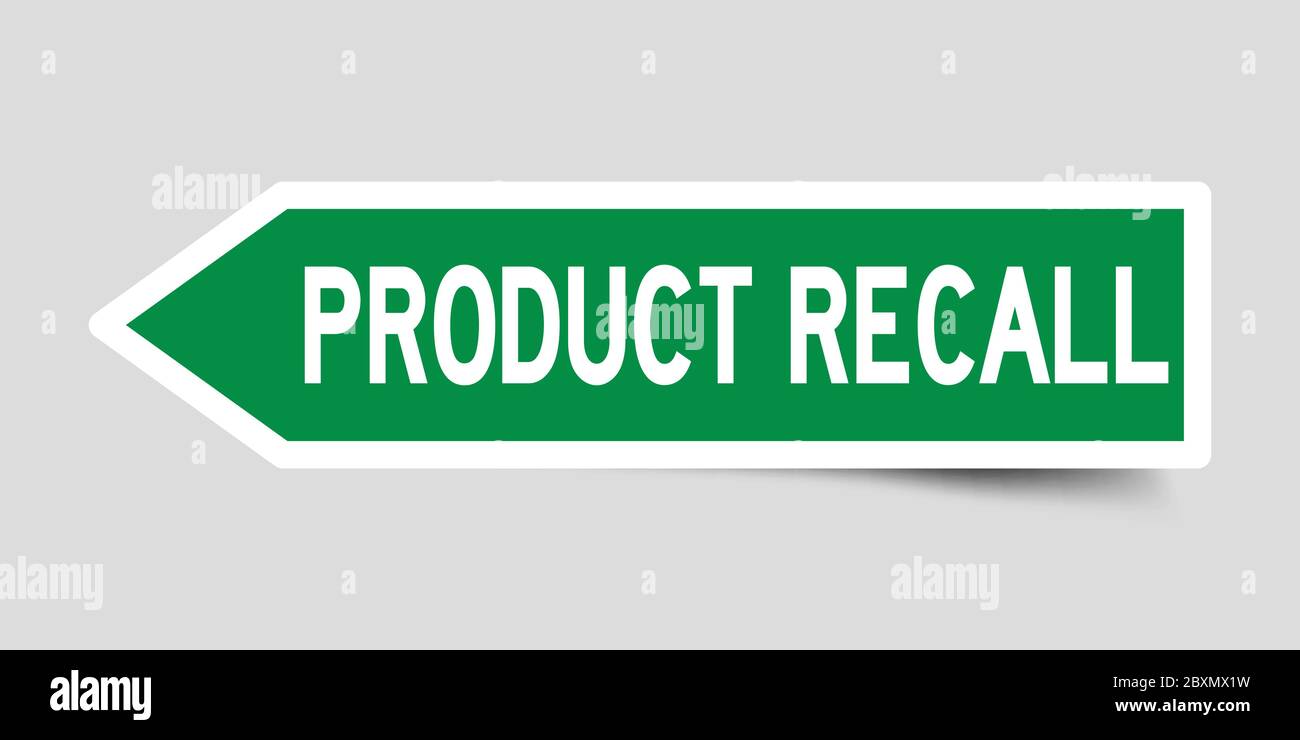 Arrow shape green color sticker in word product recall on gray ...