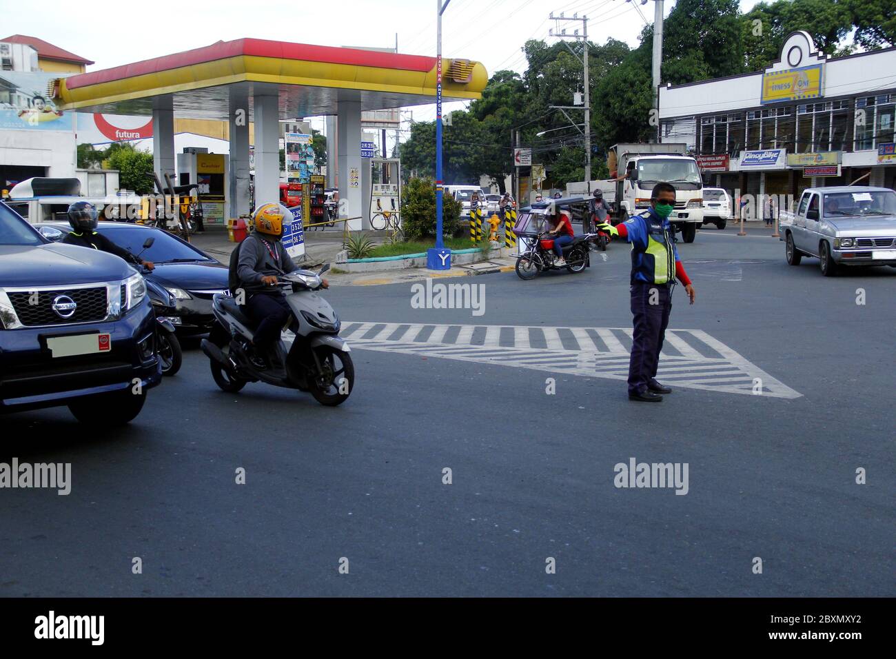 Antipolo City, Philippines - June 1, 2020: Traffic officers direct and ...