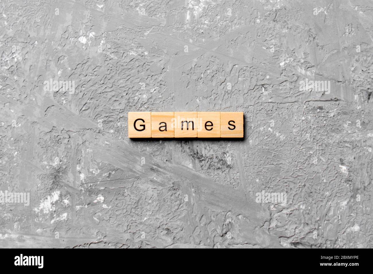 games word written on wood block. games text on table, concept Stock ...