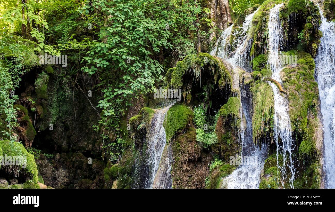 waterfall with mossy rock structure Stock Photo - Alamy