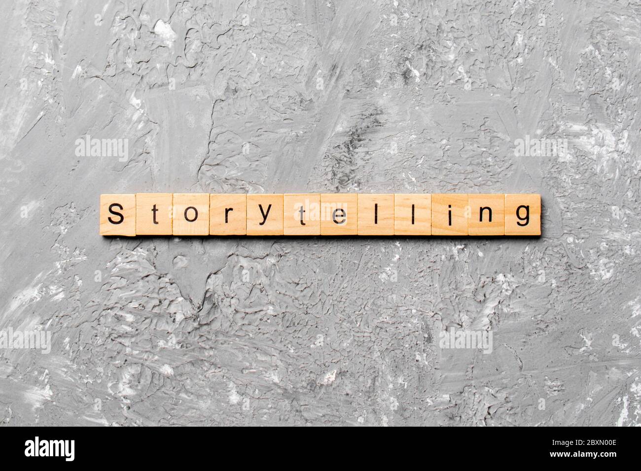 storytelling word written on wood block. storytelling text on table ...