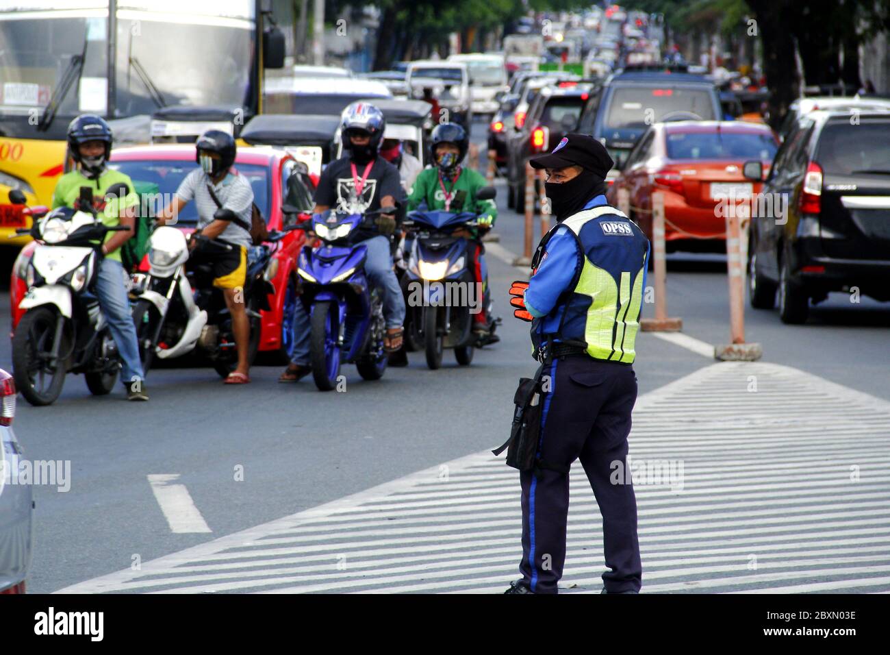 Antipolo City, Philippines - June 1, 2020: Traffic officers direct and ...