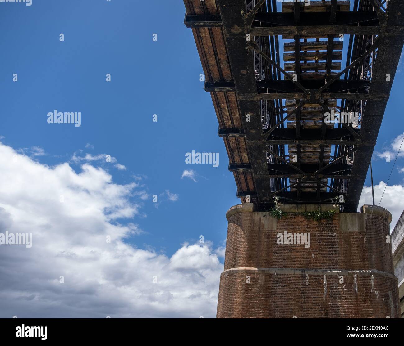 Victoria Bridge, and old iron railway bridge crossing the Perak River ...