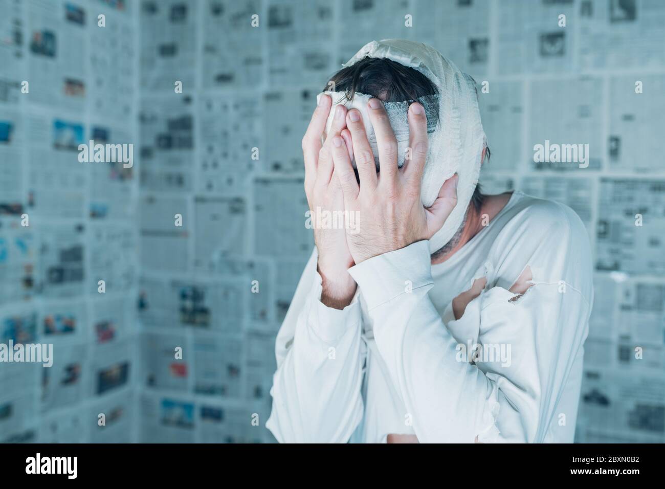 Victim of tabloid journalism and fake news infodemic, conceptual image ...