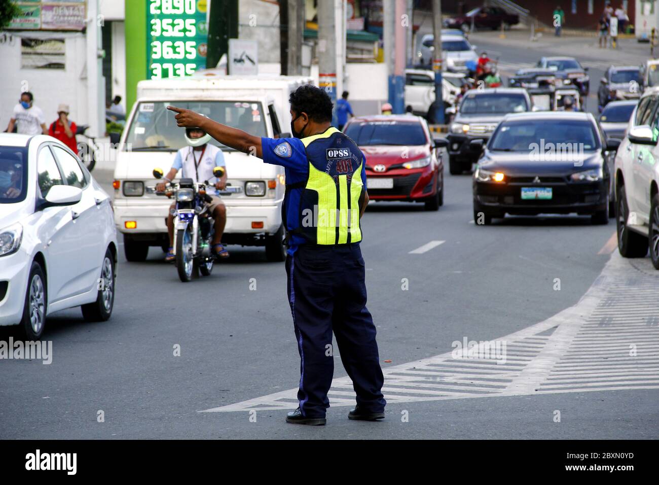 Antipolo City, Philippines - June 1, 2020: Traffic officers direct and ...