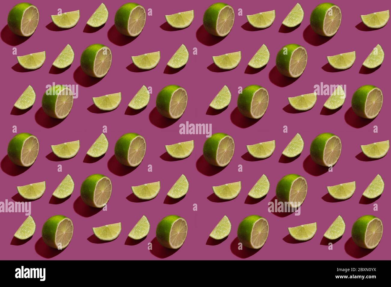 Pattern of the ripe lime cut parts on color background Stock Photo - Alamy