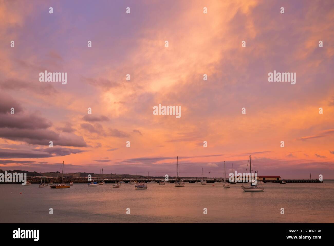 Boats at the port of Oamaru in the South Island of New Zealand. Omaru ...