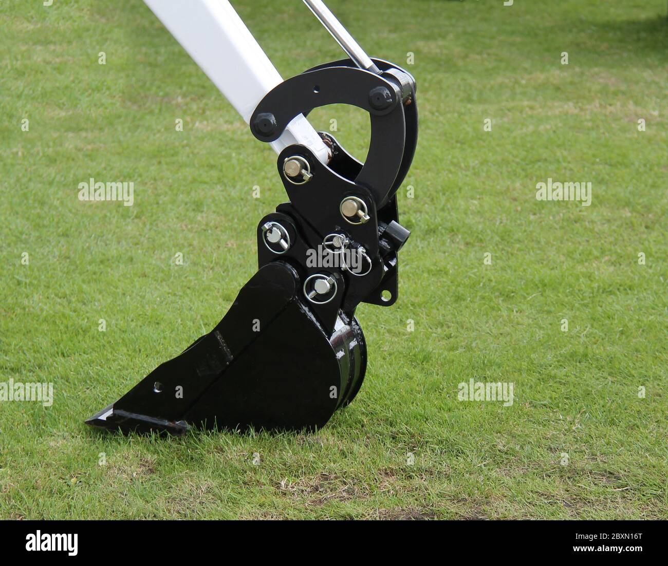 A Black Shovel on the End of a Hydraulic Excavator Arm Stock Photo - Alamy