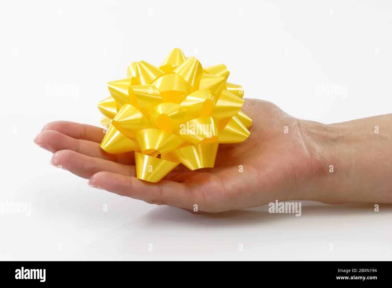 Hand bow hi-res stock photography and images - Alamy