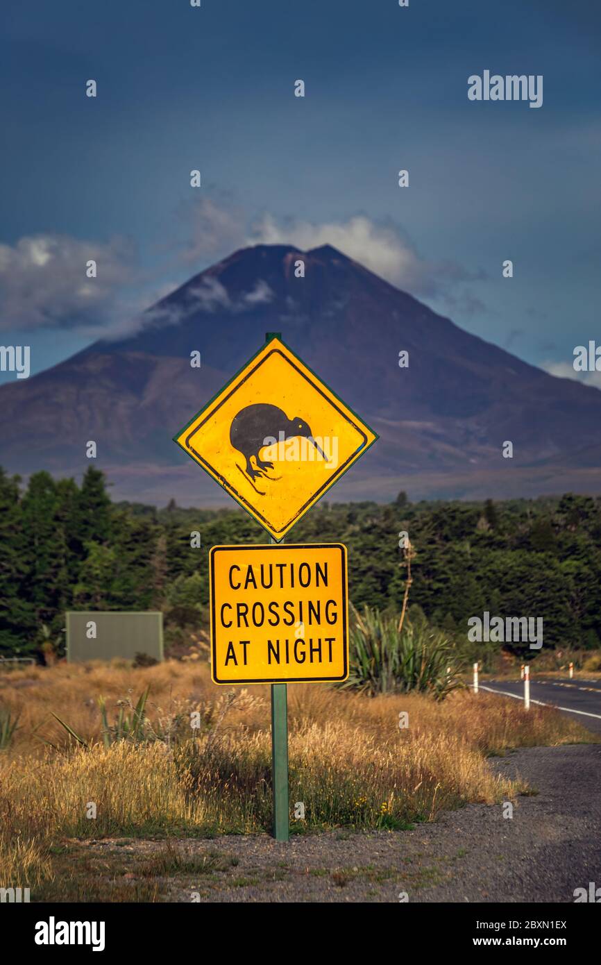 Kiwi sign with mountains at the background near Tongariro Alpine ...