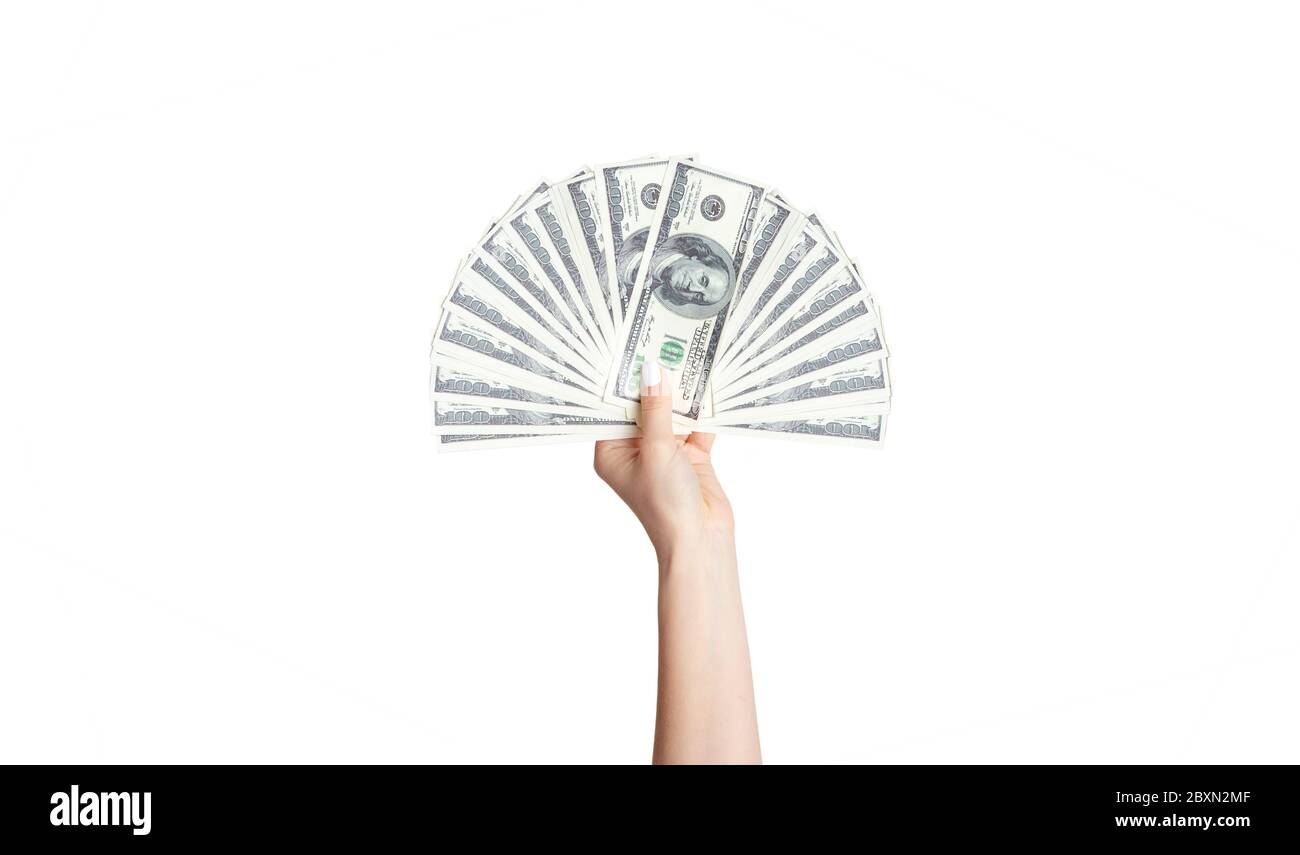 Girl showing fan of money isolated on white background, closeup ...
