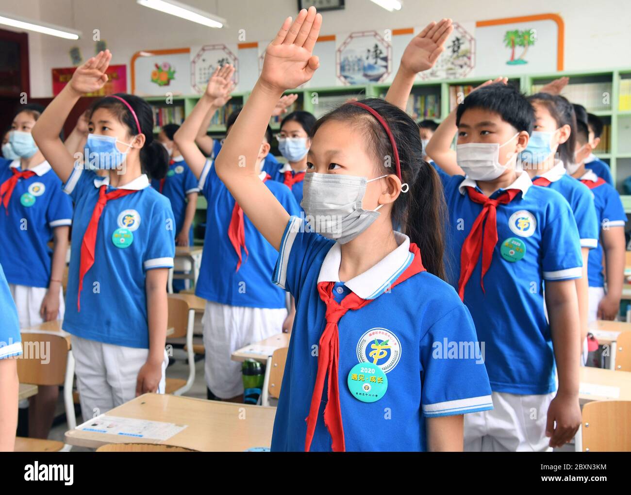 Beijing, China. 8th June, 2020. Fifth-graders attend a national flag ...