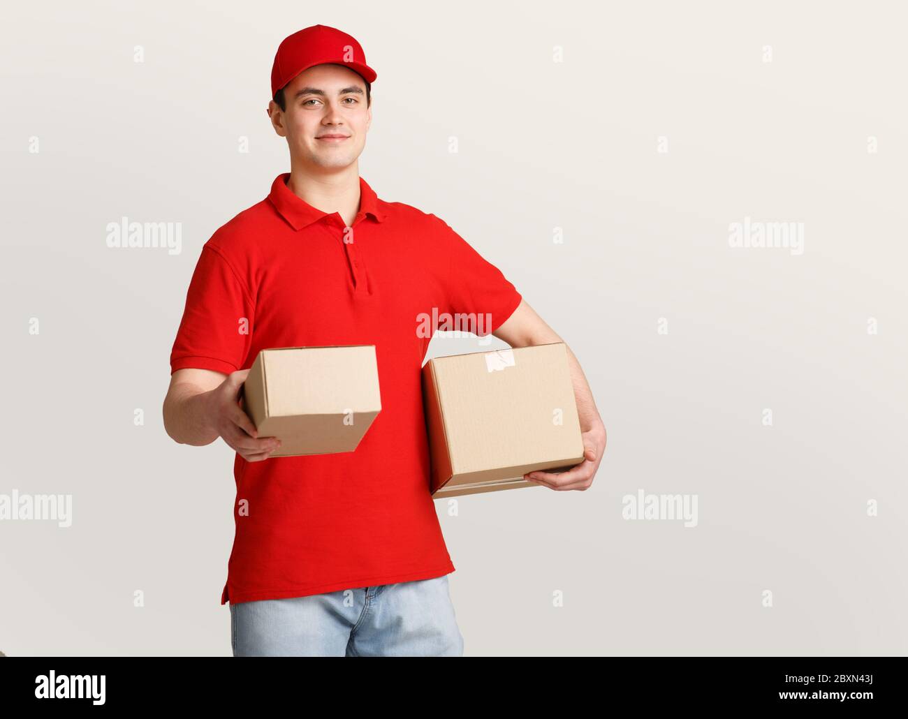 Courier parcels on doorstep hi-res stock photography and images - Alamy