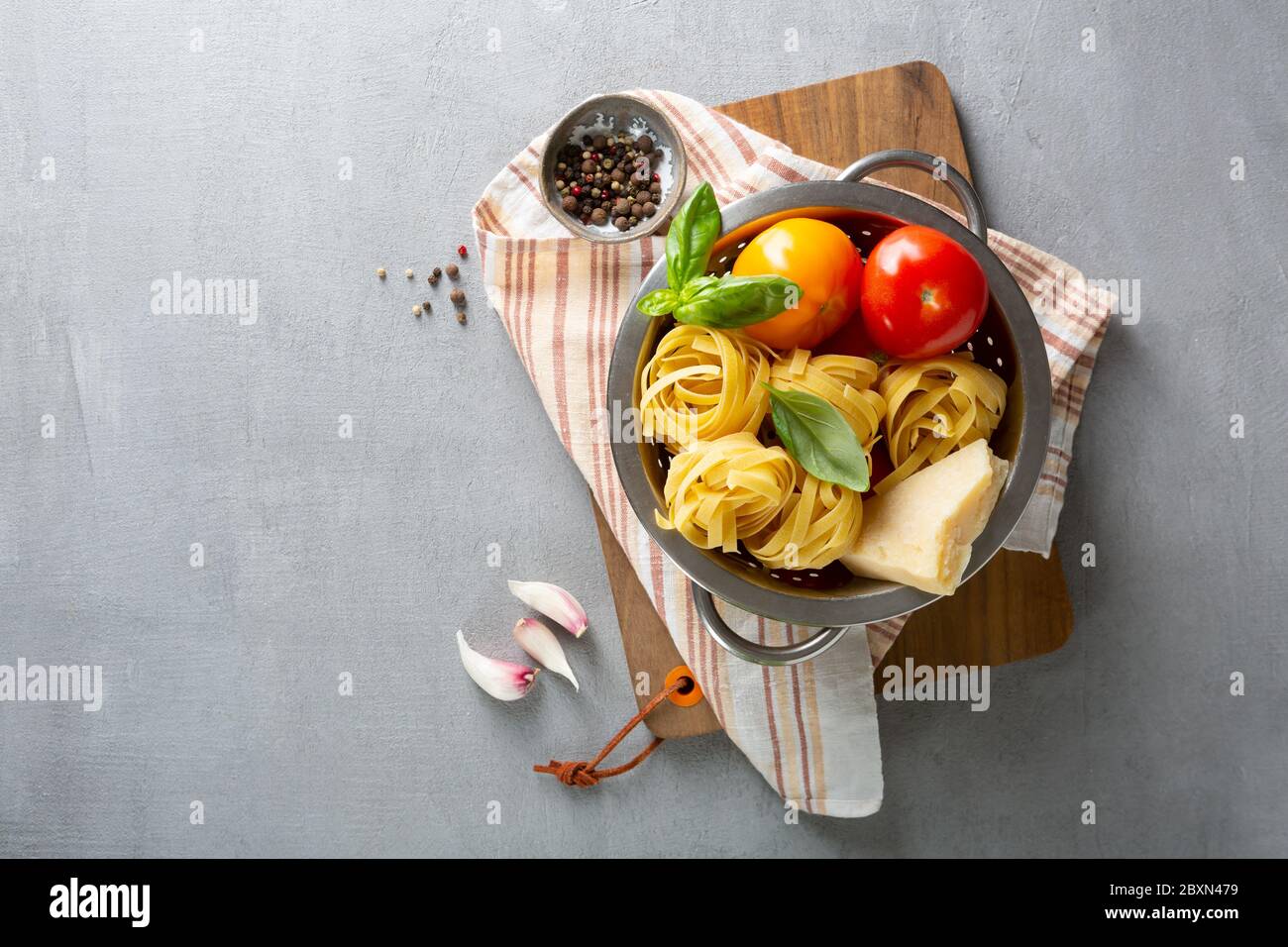Raw pasta and ingredients top view Stock Photo - Alamy