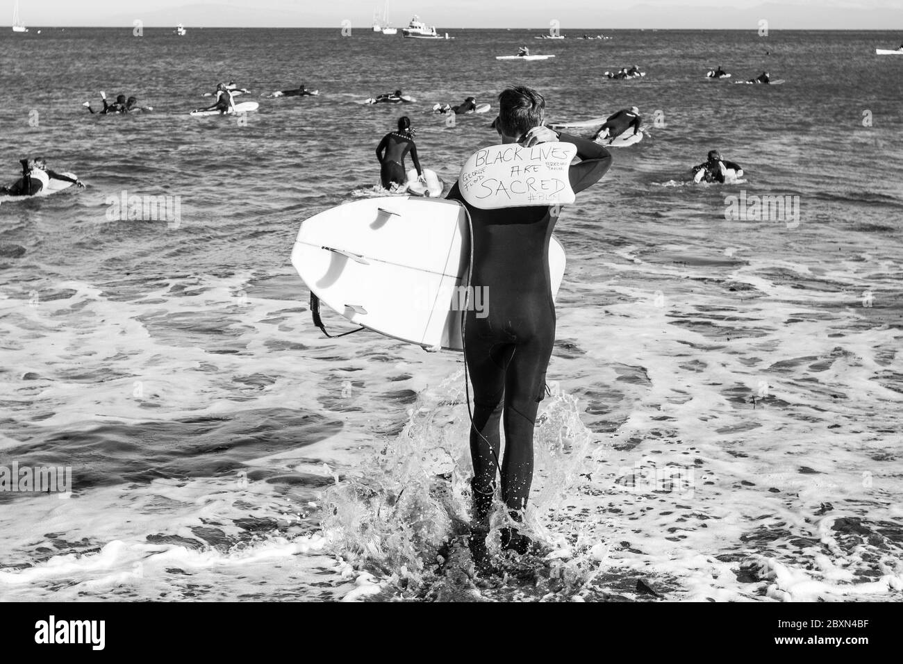 Santa Cruz, Ca. 7th June, 2020. Demonstrators participate in a "paddle ...