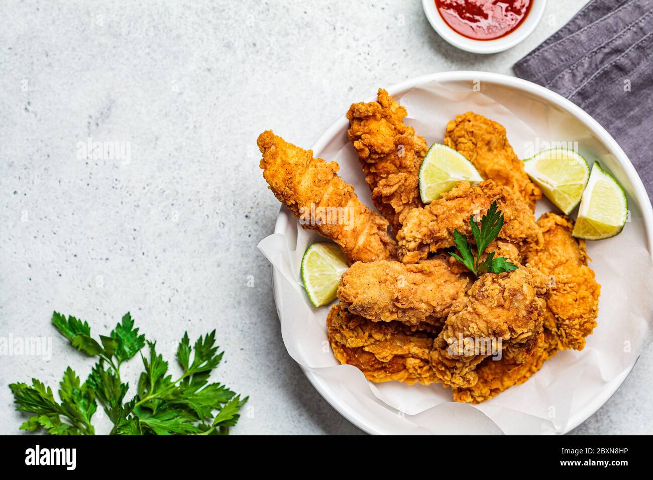 Crispy fried chicken in a white bowl, top view Stock Photo - Alamy