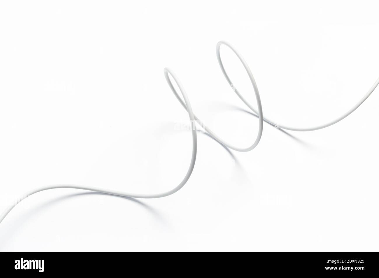 White wire isolated on a white background abstraction Stock Photo - Alamy