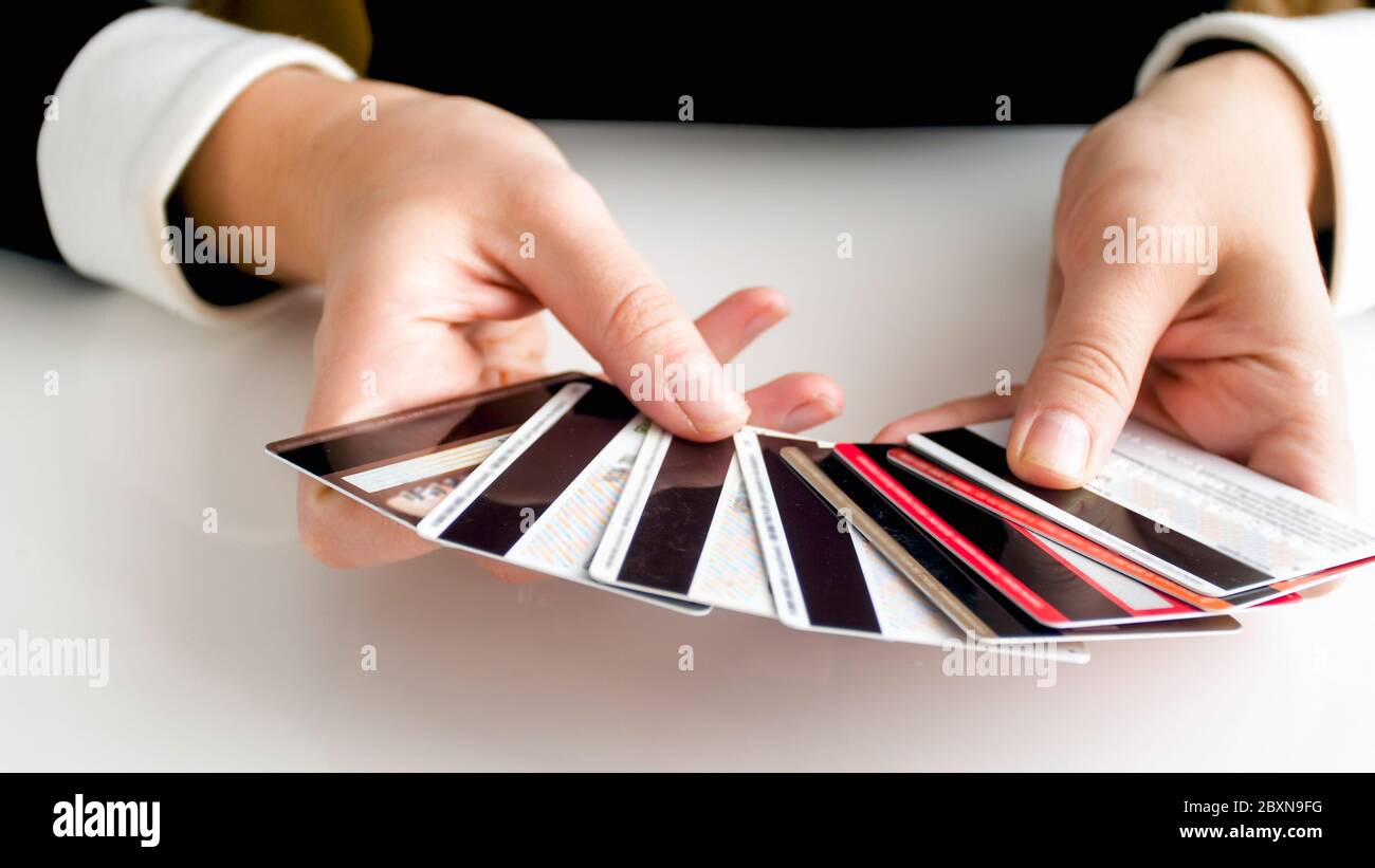 Hands holding wallet bank cards hi-res stock photography and images - Alamy