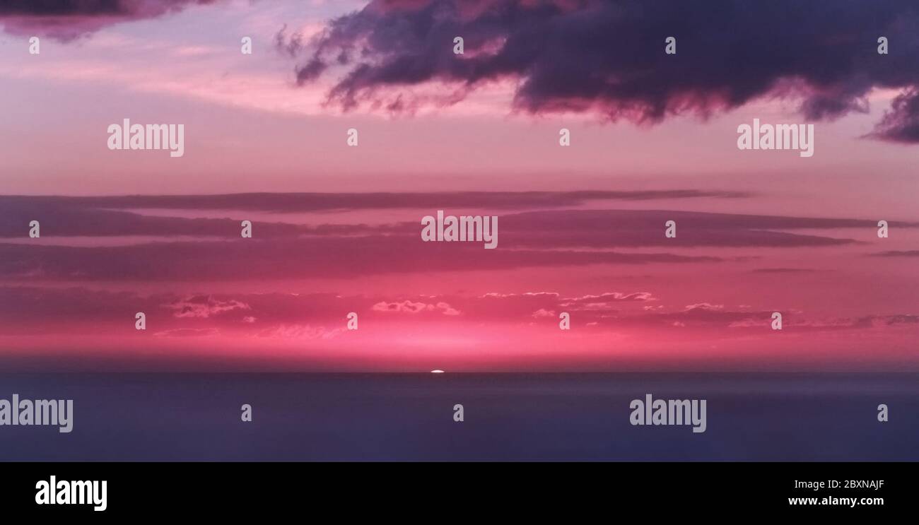 Sunrise - Suggestive magenta light with cloud and first light day in ...