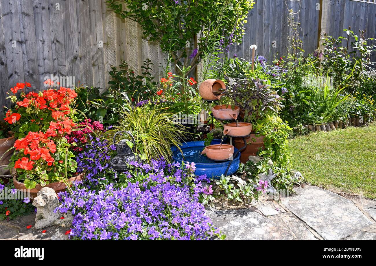 Garden solar powered water feature in small city urban garden Brighton ...