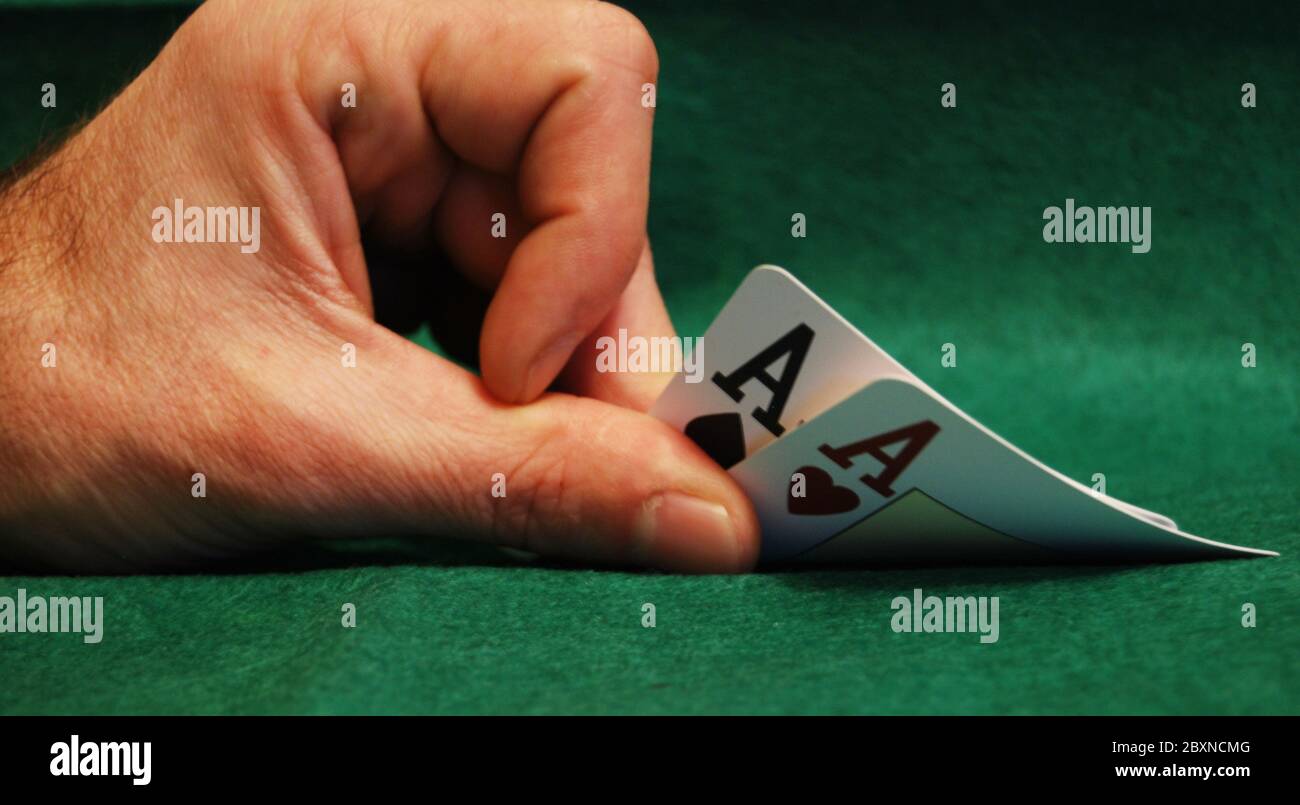 Peeking At Cards Stock Photo - Alamy