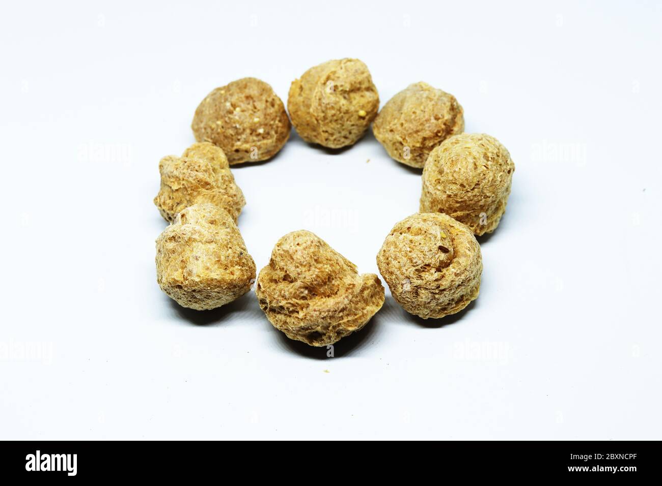 Soya protein chunks used in vegetarian and vegan food, isolated on a ...