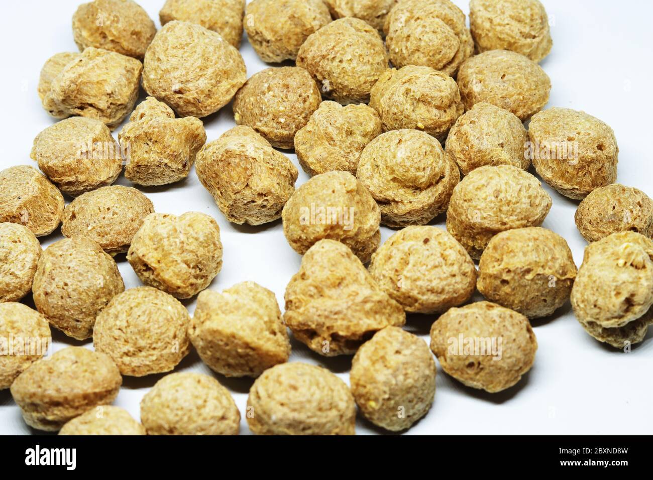 Soya protein chunks used in vegetarian and vegan food, isolated on a ...