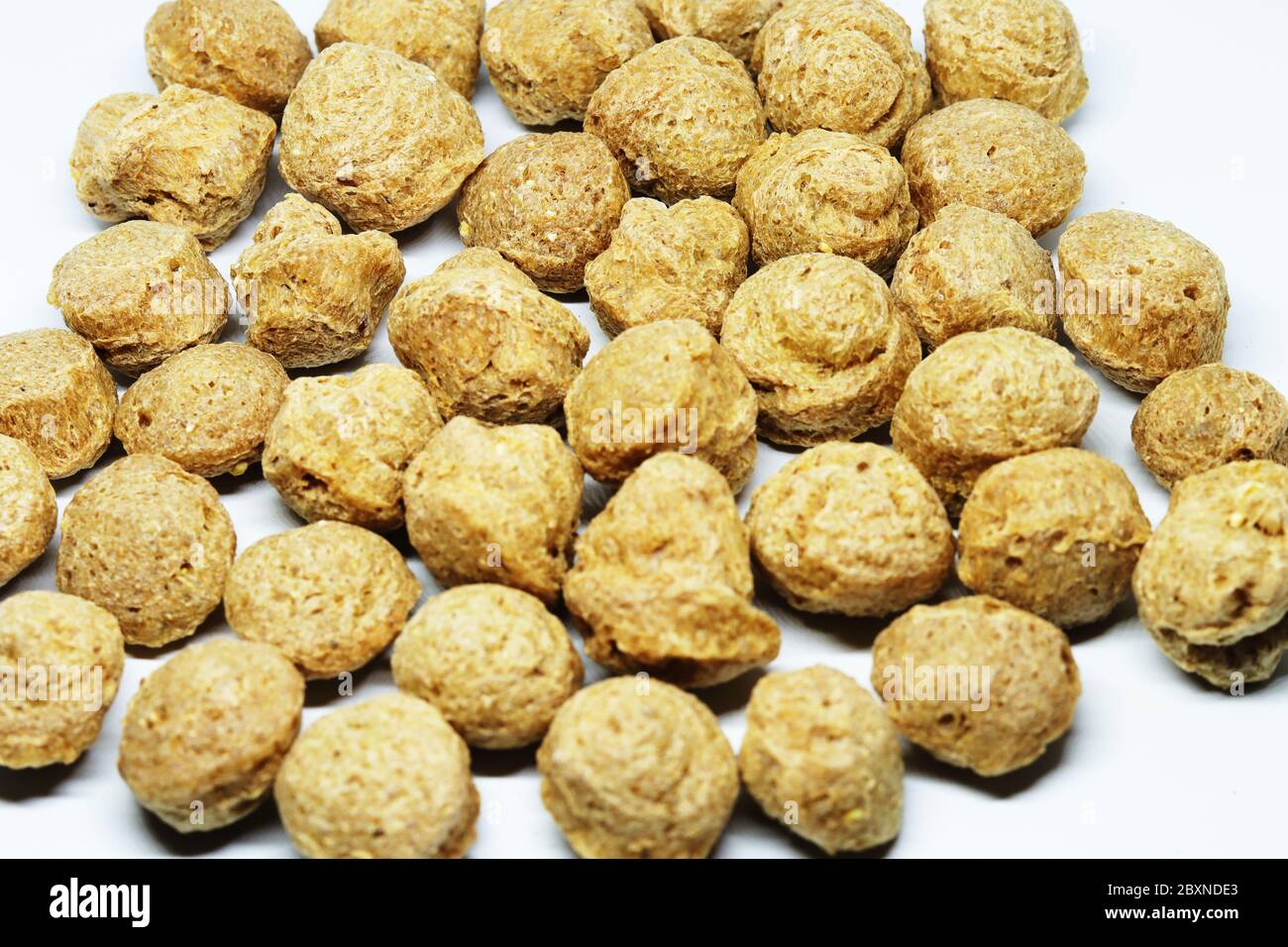 Soya protein chunks used in vegetarian and vegan food, isolated on a ...