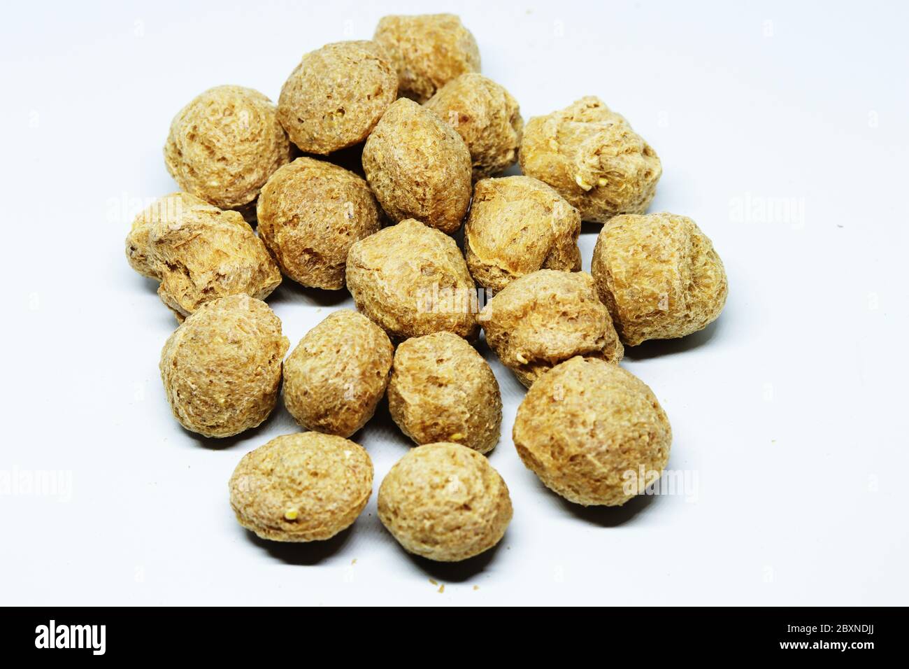 Soya protein chunks used in vegetarian and vegan food, isolated on a ...