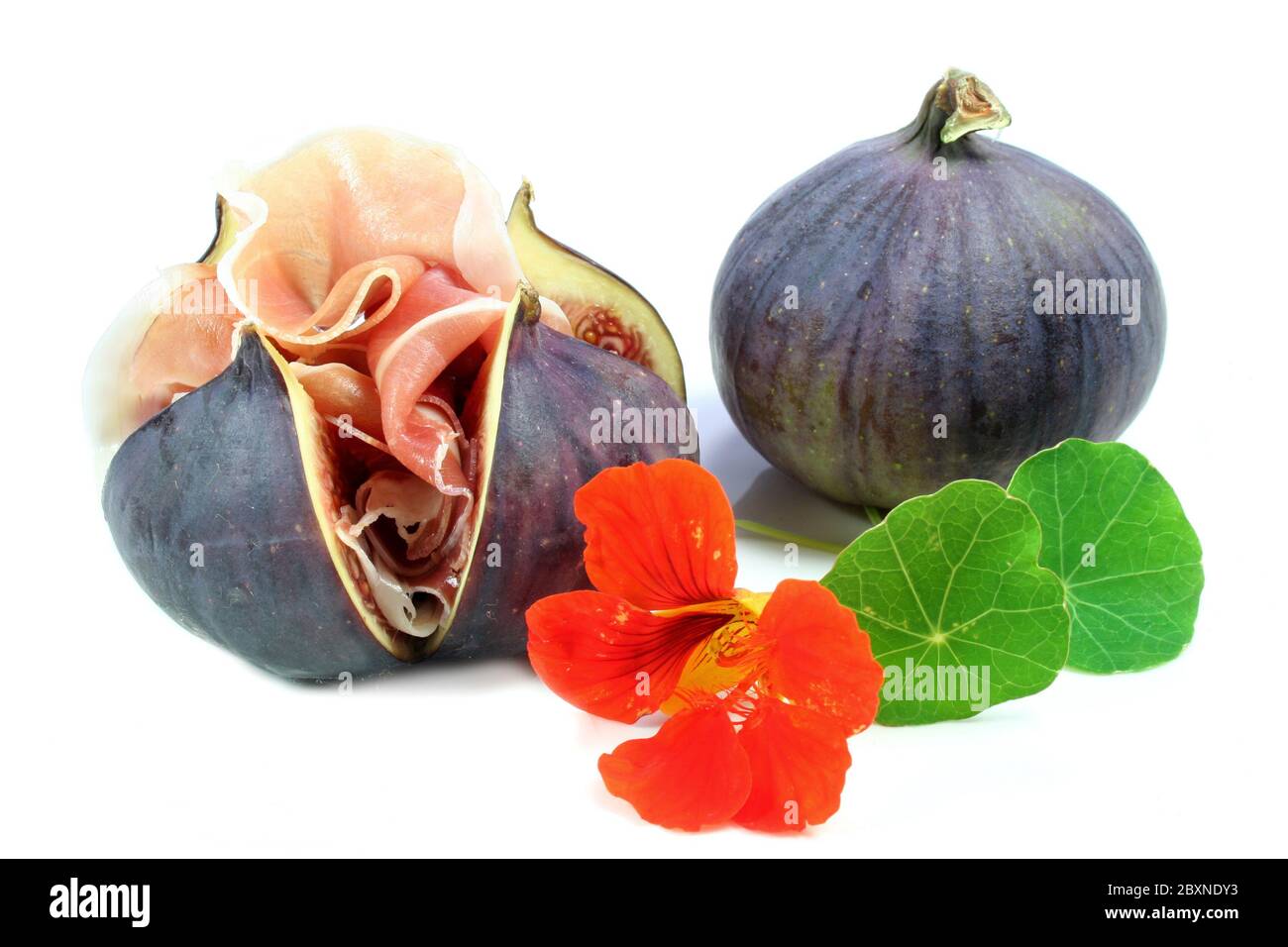 Figs with Serrano ham Stock Photo - Alamy