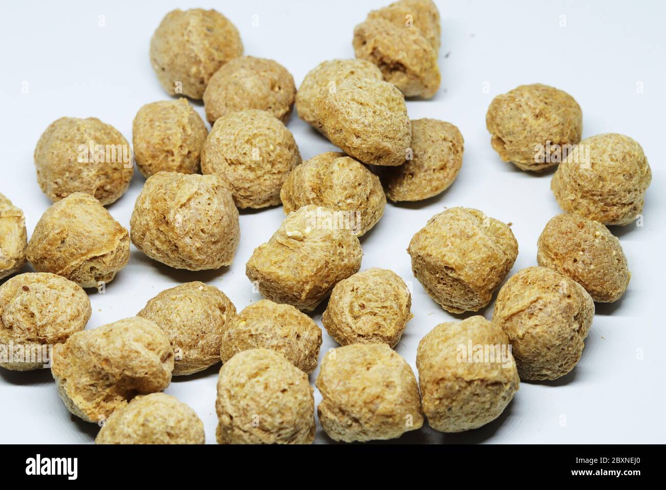 Soya protein chunks used in vegetarian and vegan food, isolated on a ...