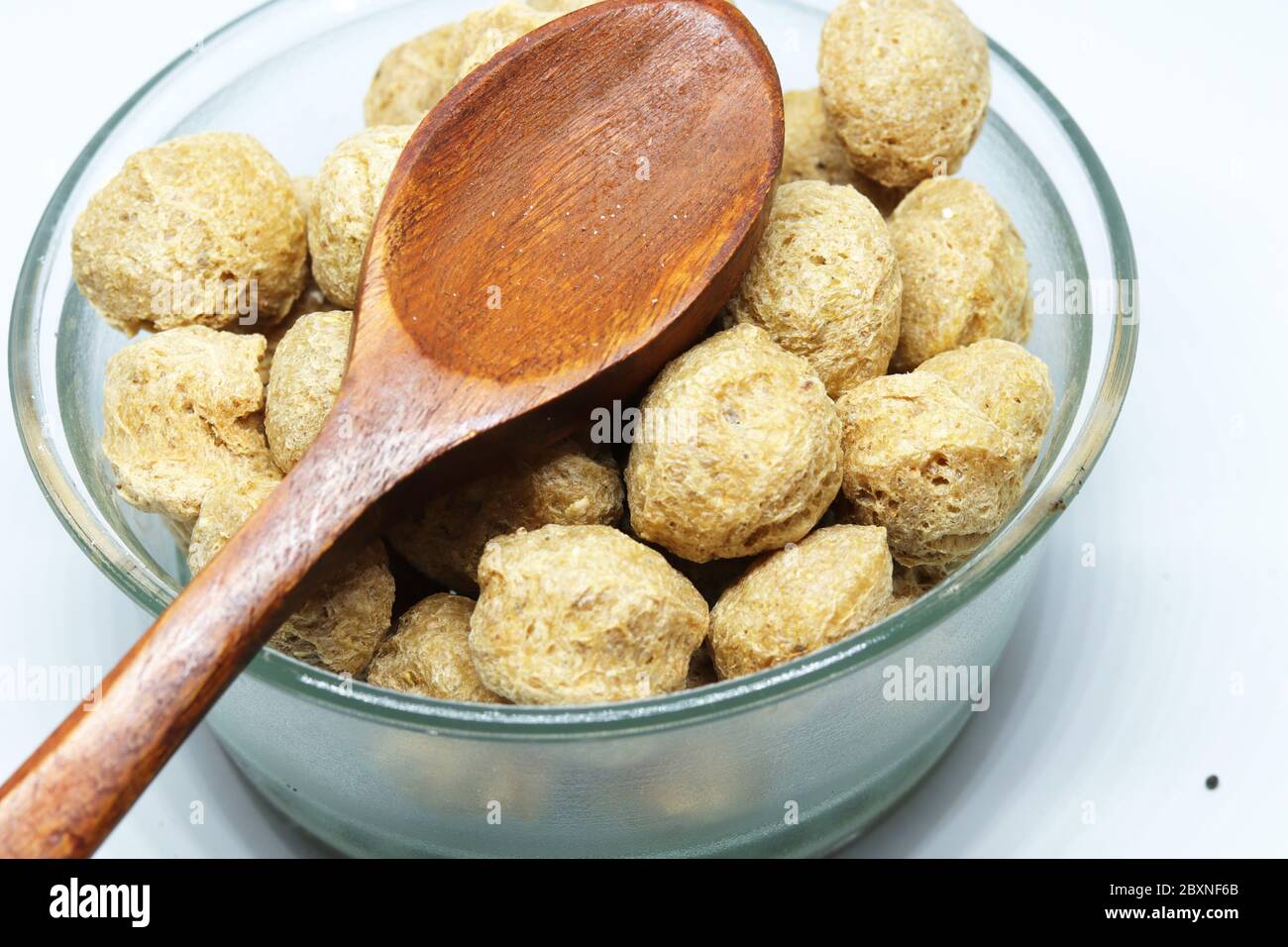 Soya protein chunks used in vegetarian and vegan food, isolated on a ...