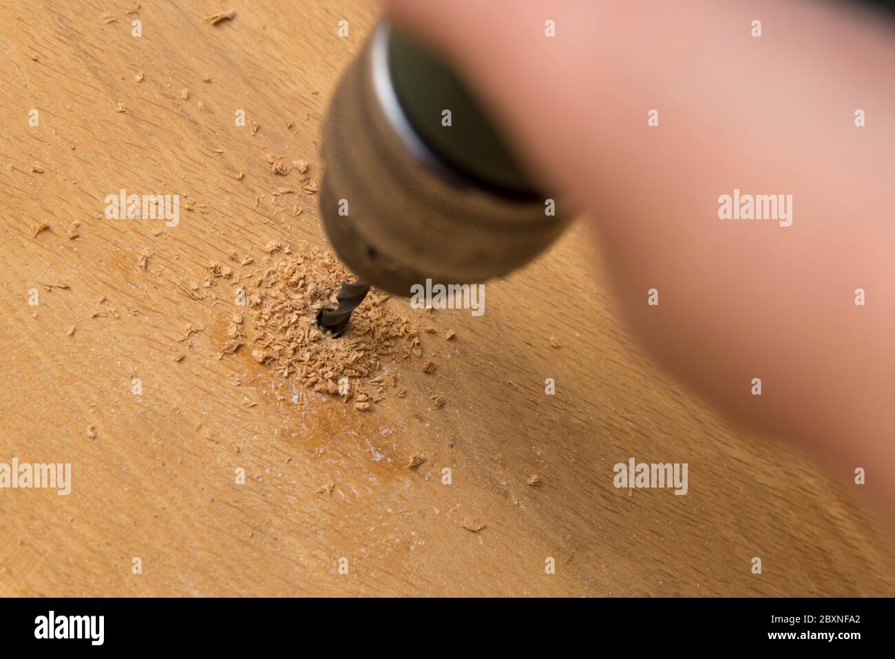 Carpenter making hole in wood hi-res stock photography and images - Alamy