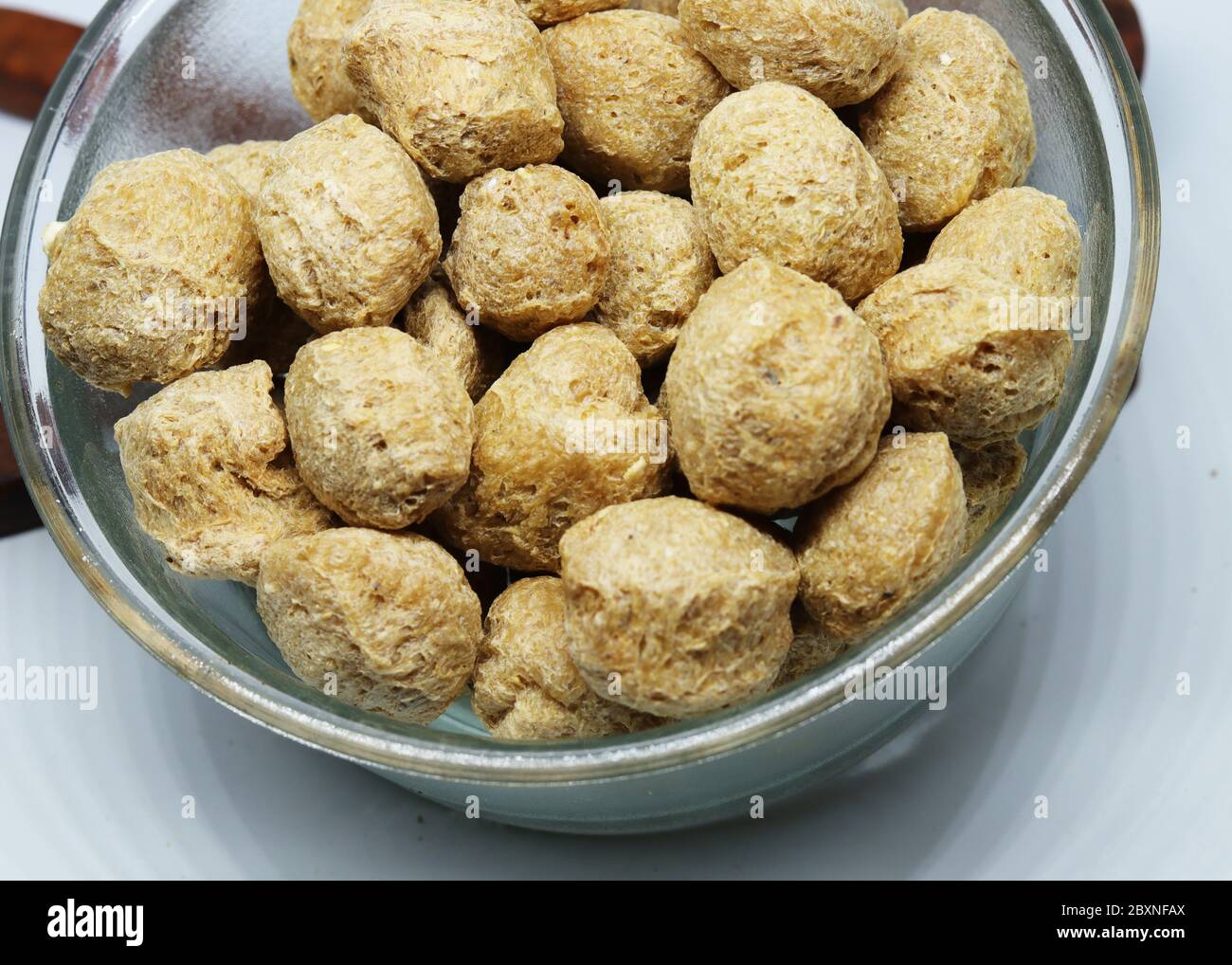 Soya protein chunks used in vegetarian and vegan food, isolated on a ...