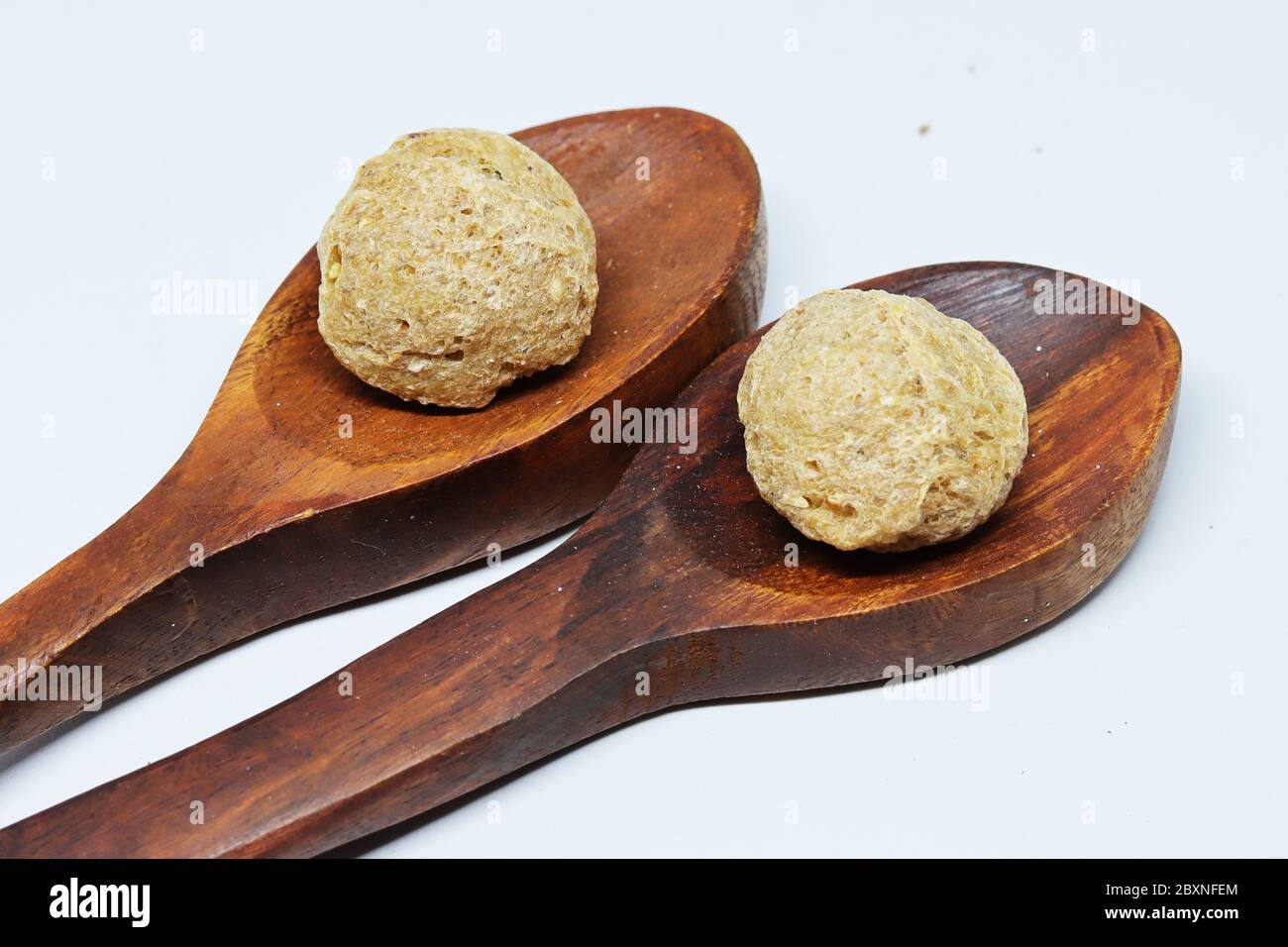 Soya protein chunks used in vegetarian and vegan food, isolated on a ...