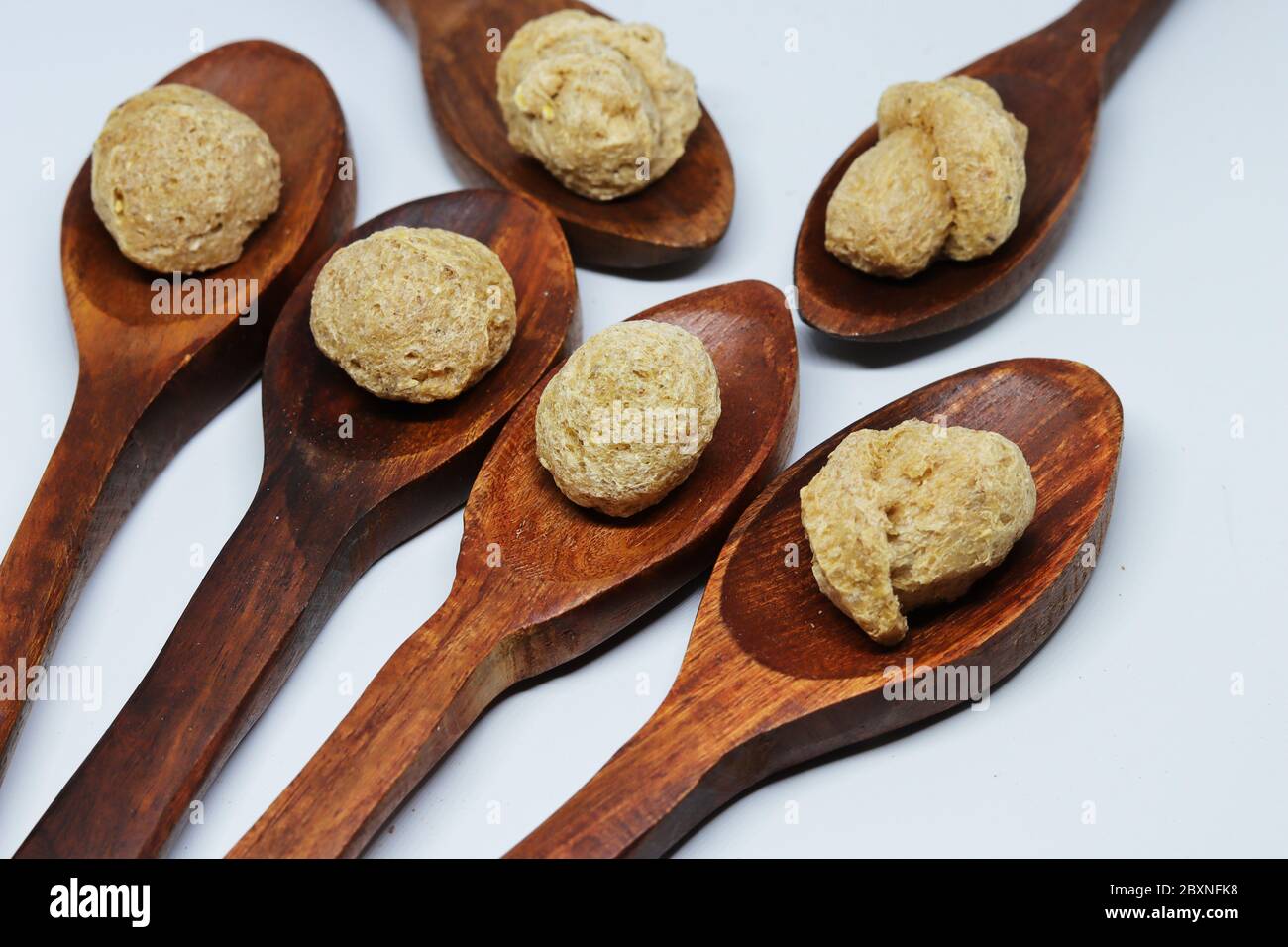 Soya protein chunks used in vegetarian and vegan food, isolated on a ...