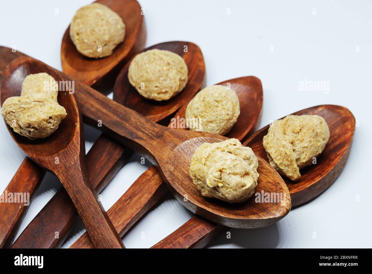 Soya protein chunks used in vegetarian and vegan food, isolated on a ...