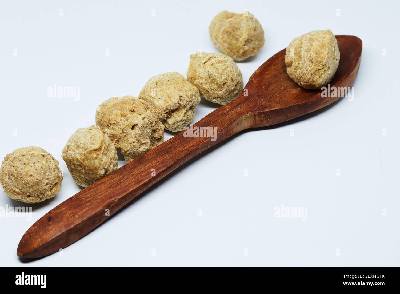 Soya protein chunks used in vegetarian and vegan food, isolated on a ...