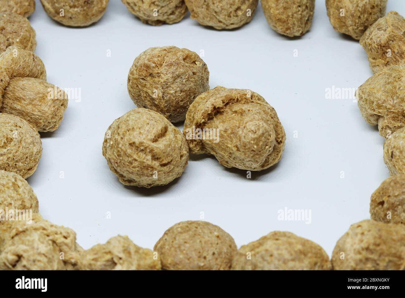 Soya protein chunks used in vegetarian and vegan food, isolated on a ...