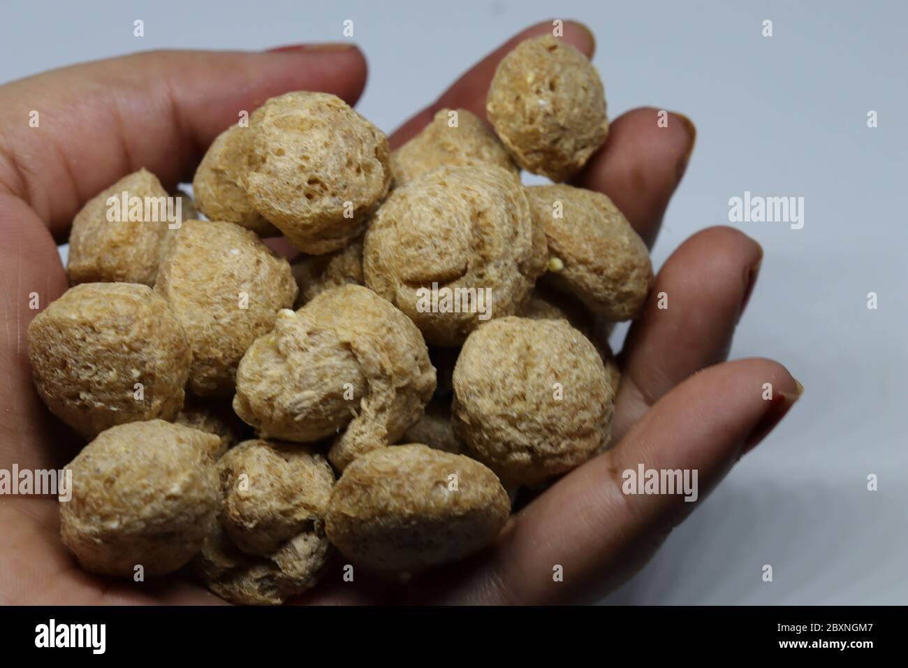 Soya protein chunks used in vegetarian and vegan food, isolated on a ...