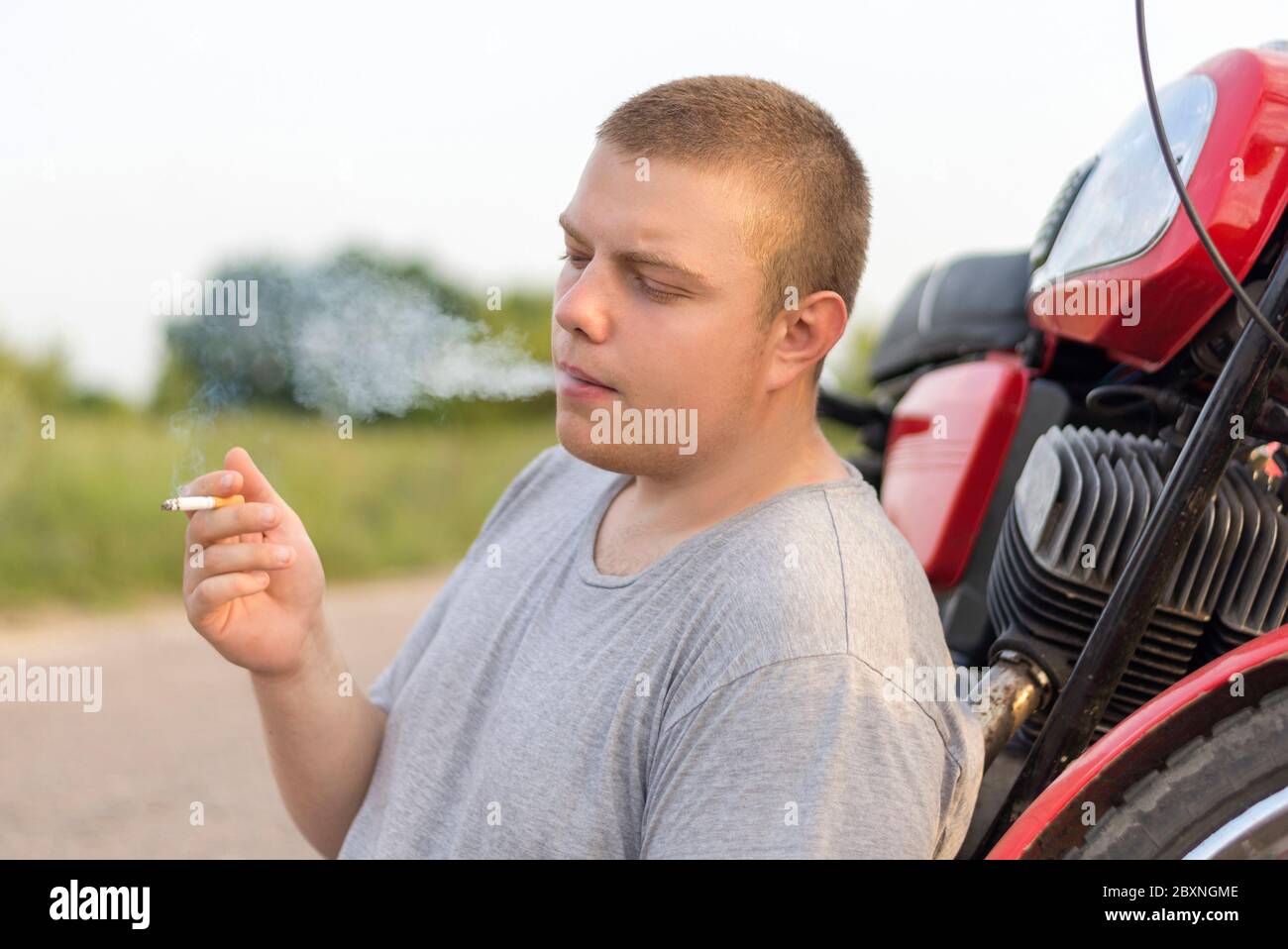 Biker smoking cigar hi-res stock photography and images - Alamy