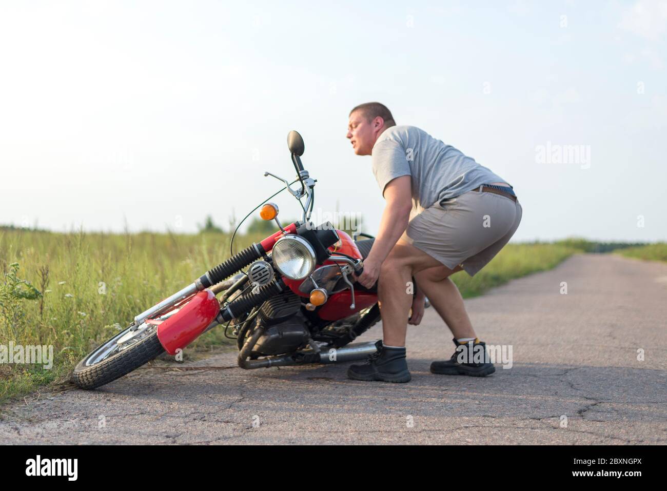 Biker fell off his bike hi-res stock photography and images - Alamy